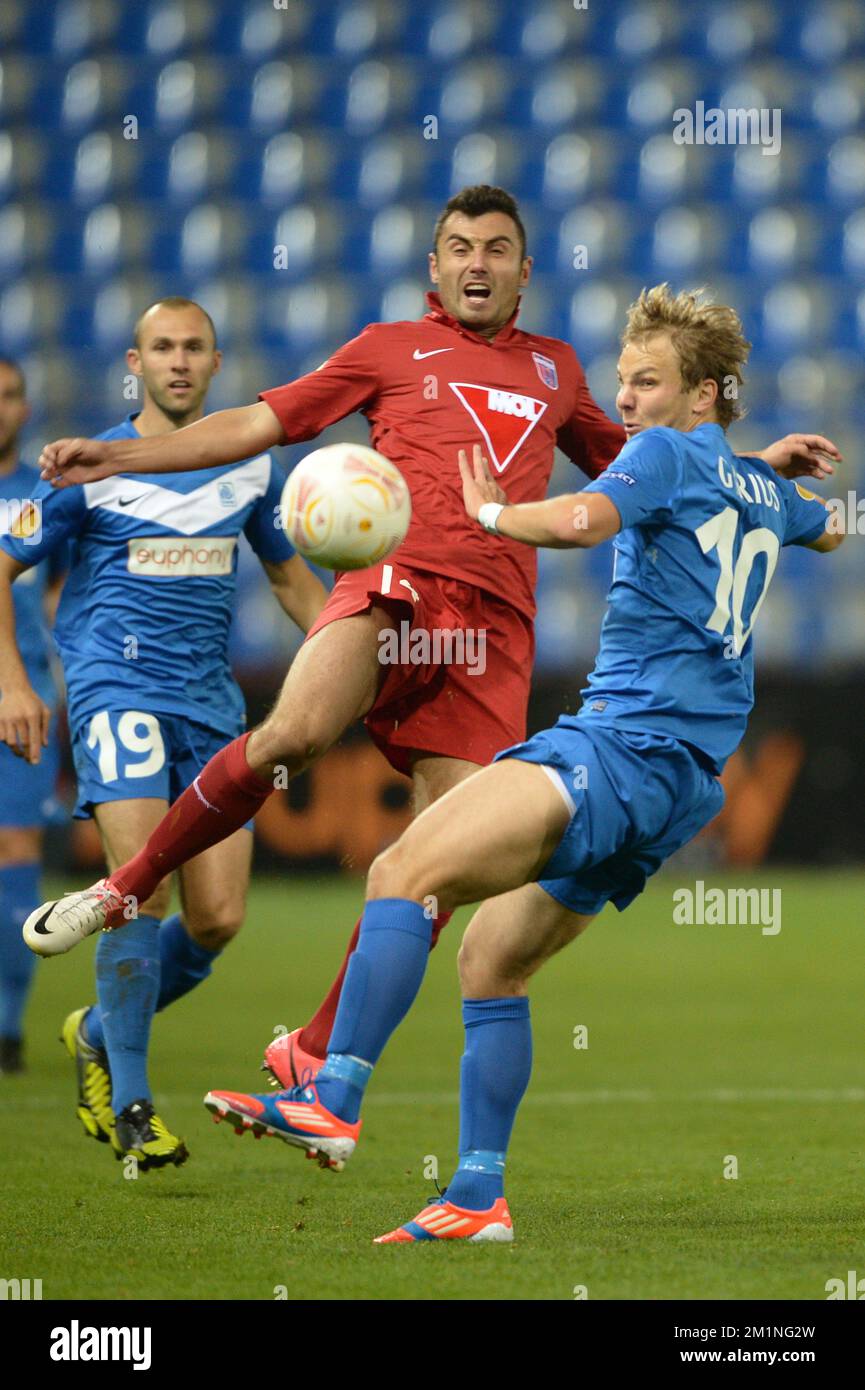 20120920 - GENK, BELGIUM: Videoton's Nikola Mitrovic and Genk's Julien ...