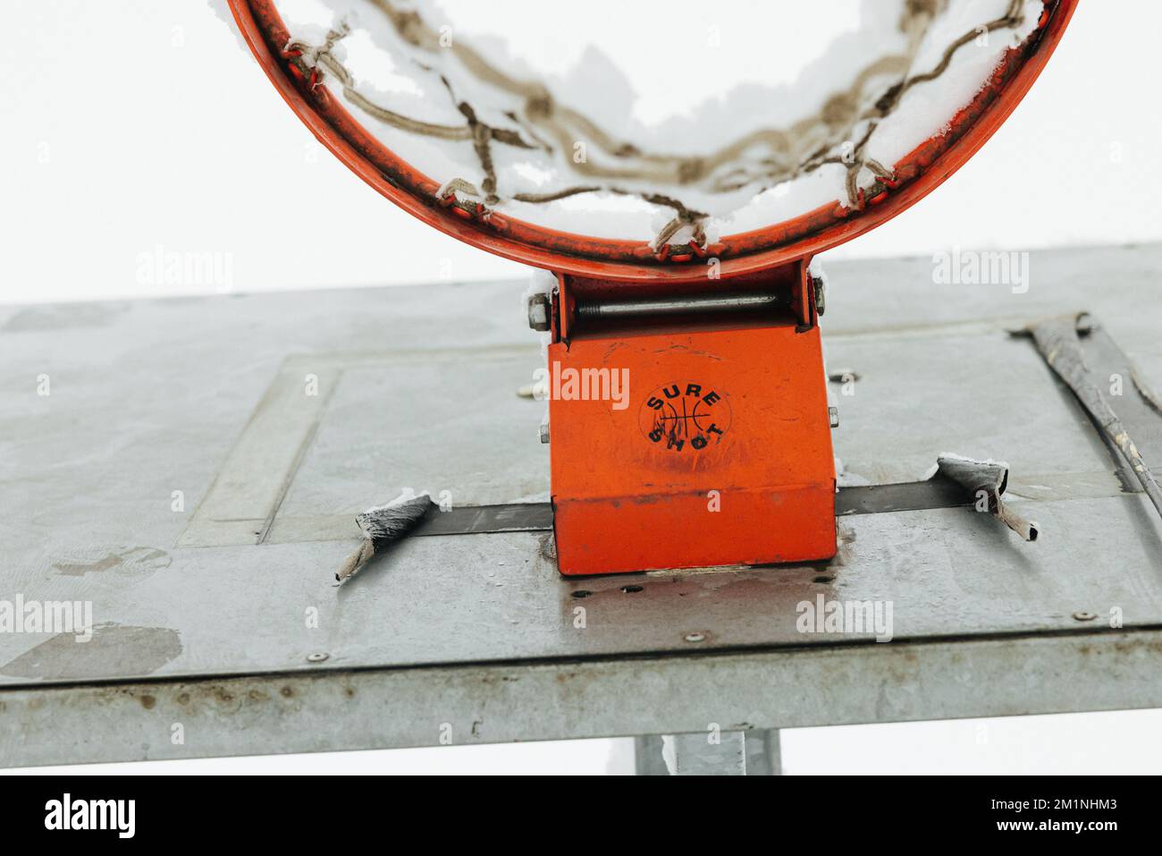 Views of snow on the outdoor basketball court in Clissold Park, Hackney ...