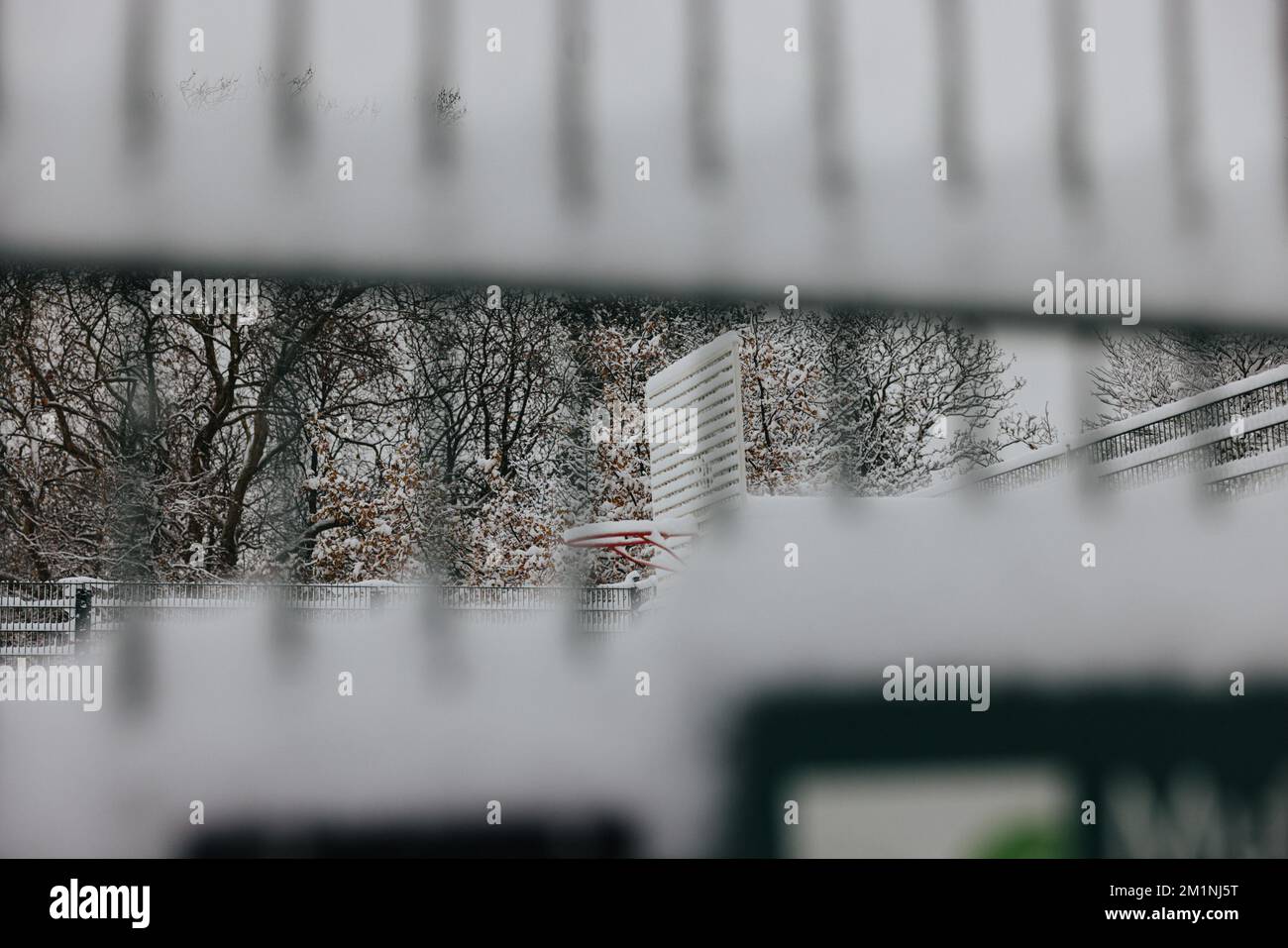 Views of snow on the outdoor basketball court in Clissold Park, Hackney ...