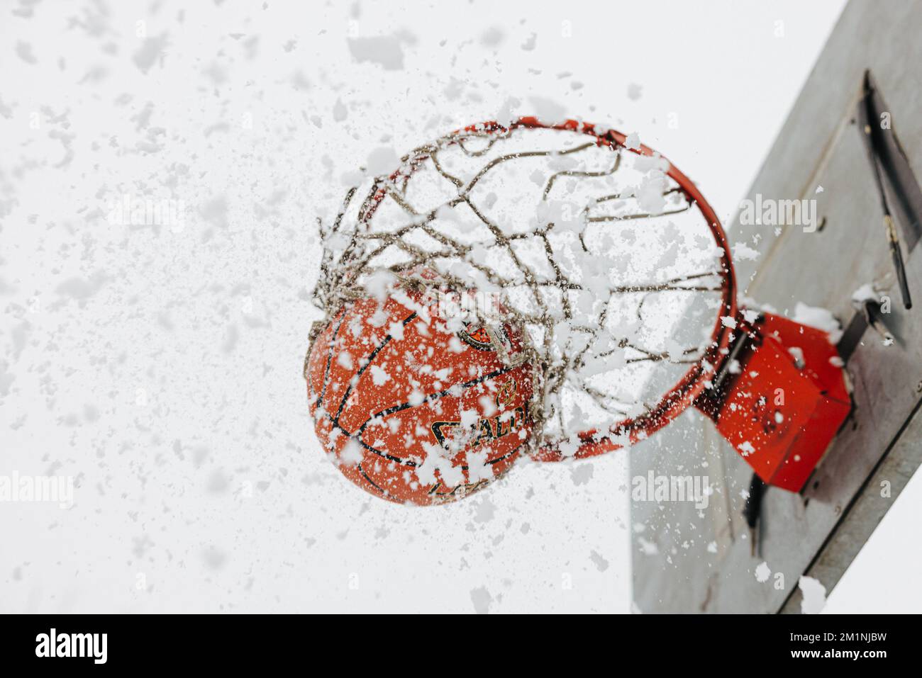 Views of snow on the outdoor basketball court in Clissold Park, Hackney ...