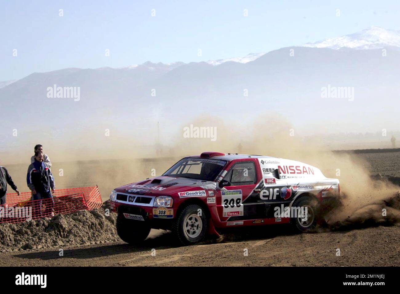 Scottish driver Colin Mac Rae and Tina Thorner steer their Nissan car ...