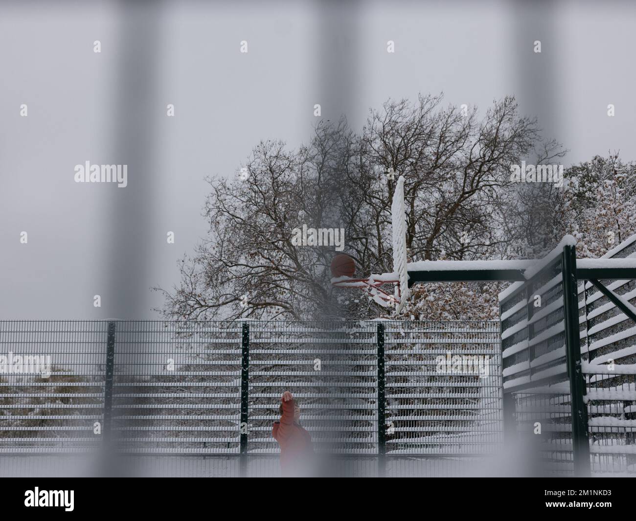 Views of snow on the outdoor basketball court in Clissold Park, Hackney ...