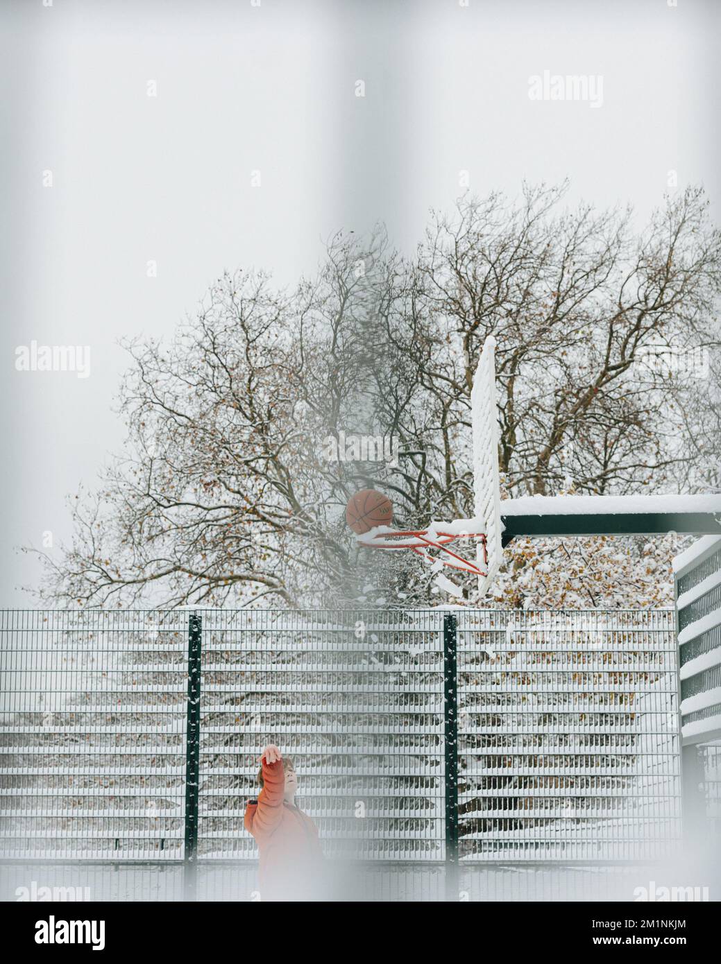 Views of snow on the outdoor basketball court in Clissold Park, Hackney ...
