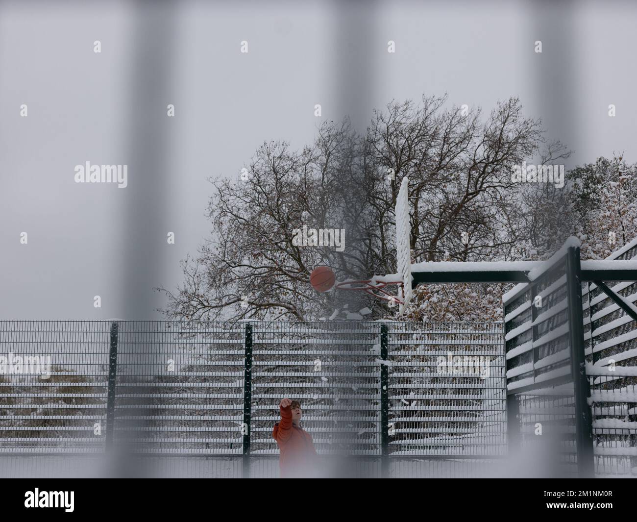 Views of snow on the outdoor basketball court in Clissold Park, Hackney ...
