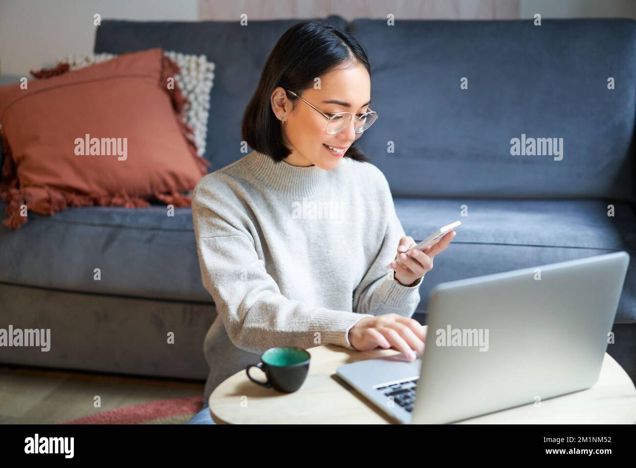 Portrait of working businesswoman using laptop, work on remote. Korean ...