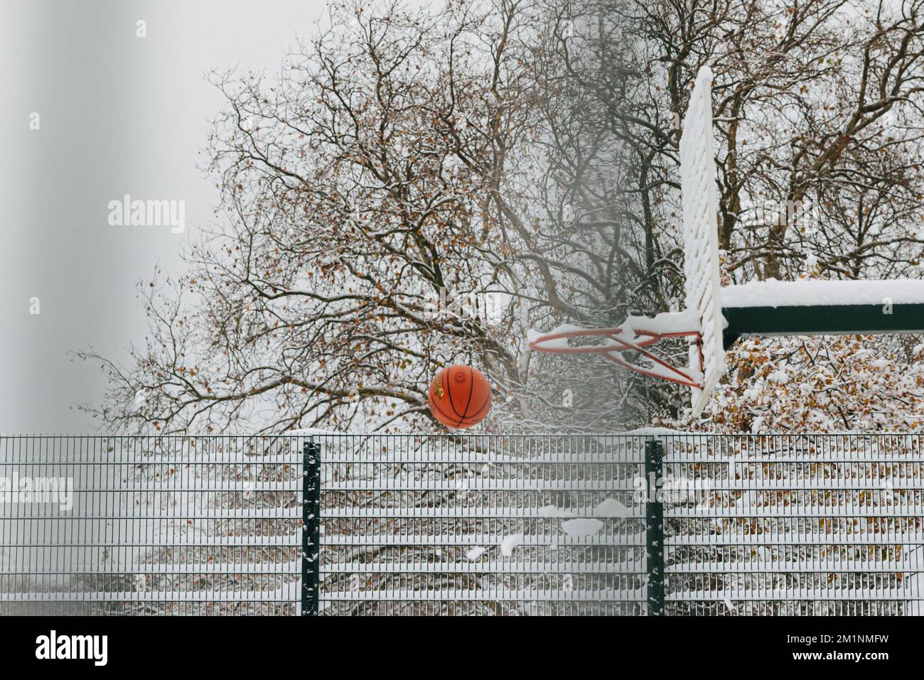 Views of snow on the outdoor basketball court in Clissold Park, Hackney ...