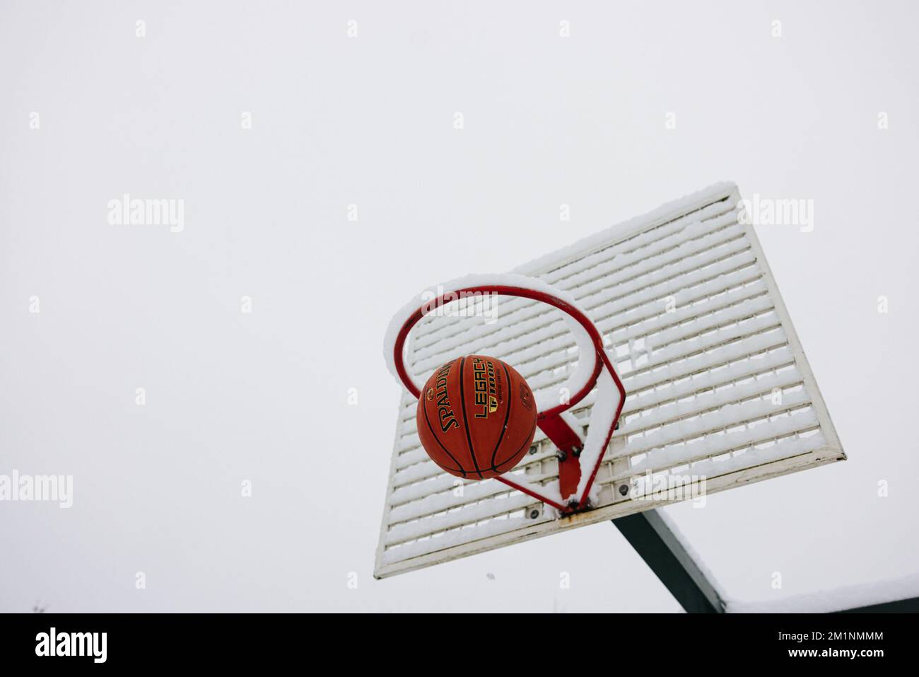 Views of snow on the outdoor basketball court in Clissold Park, Hackney ...