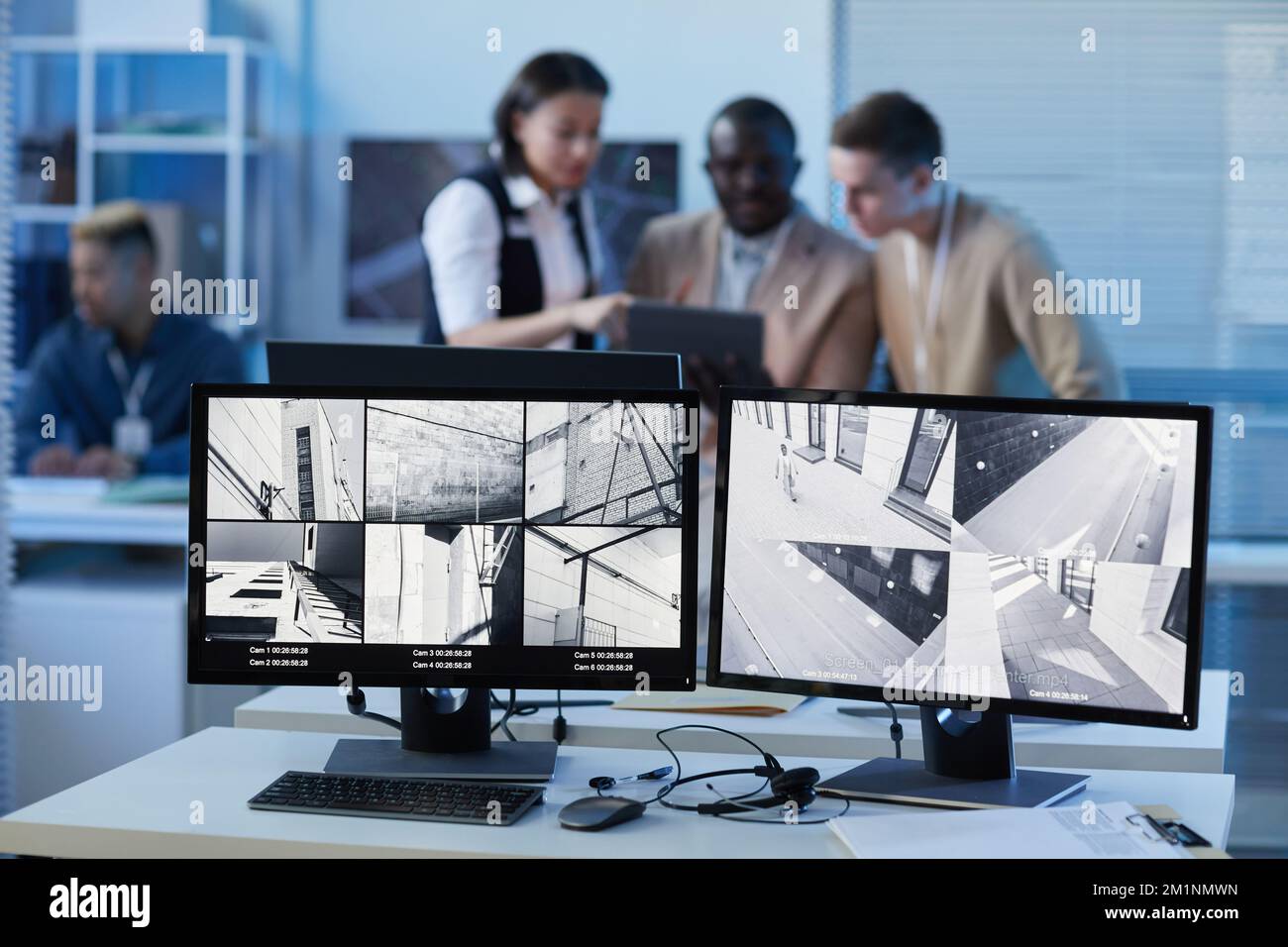 Background Image Of Two Computer Screens With Surveillance Camera Feed