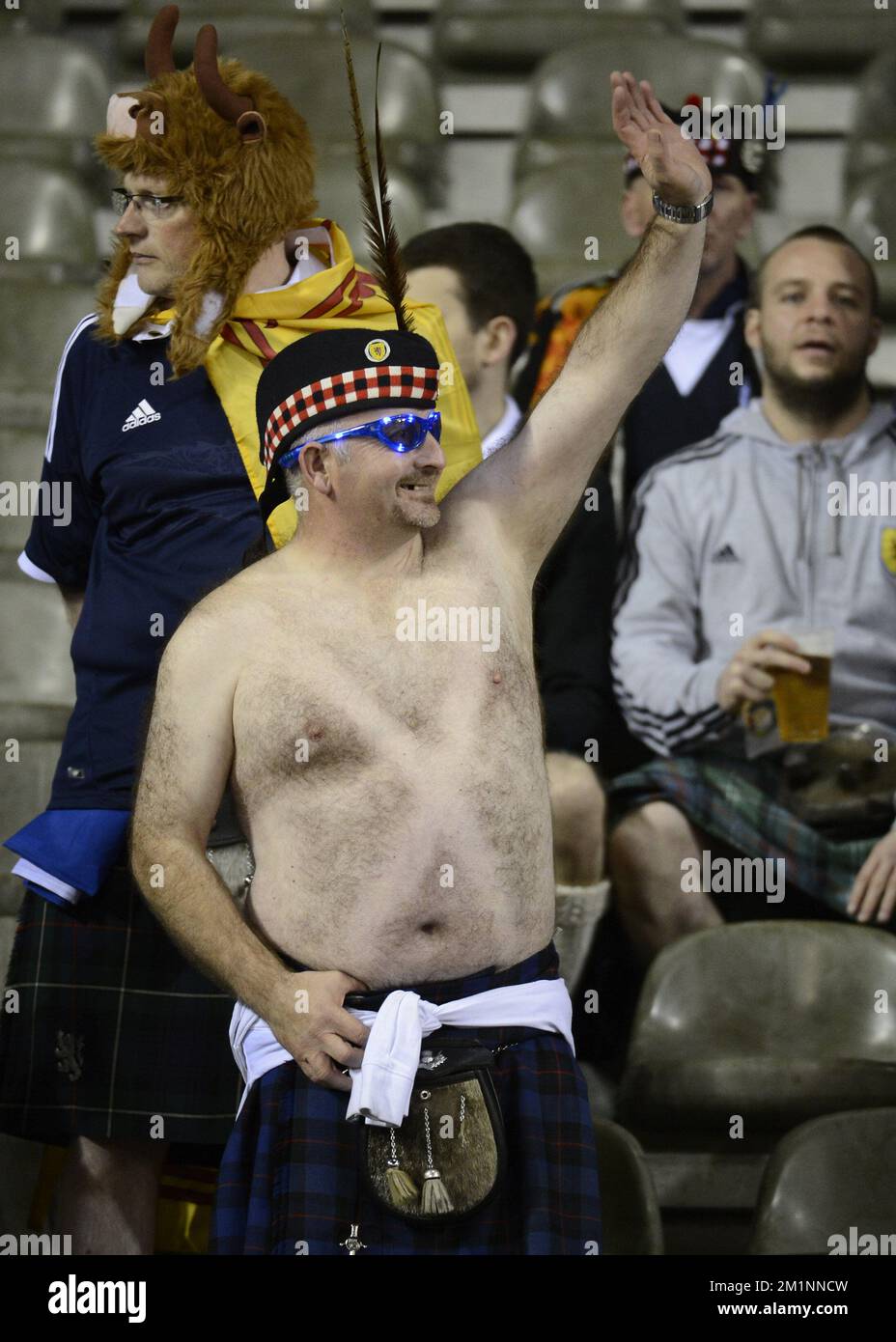 Scottish supporter wearing a kilt pictured in the stands Stock Photo ...
