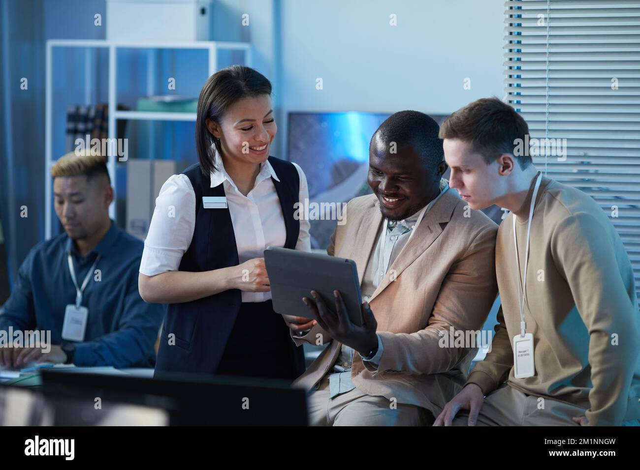 Background image of diverse group of people smiling while working in ...