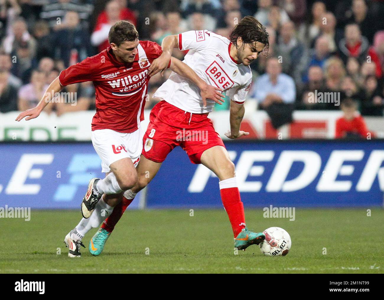 20121021 - MONS, BELGIUM: Mons' Jeremy Sapina and Standard's Astrit ...