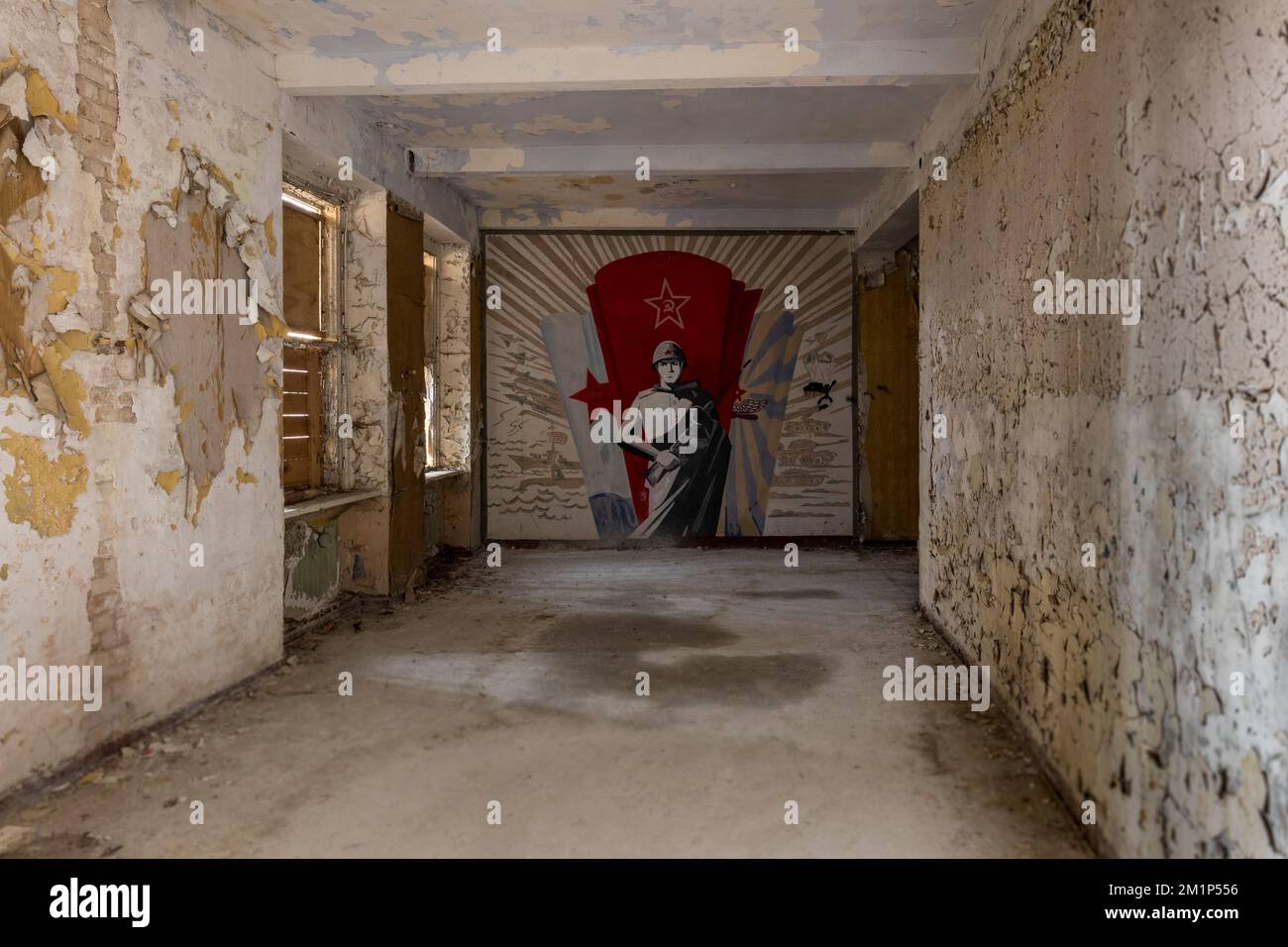 An interior of a delipidated prison cell in the former German ...