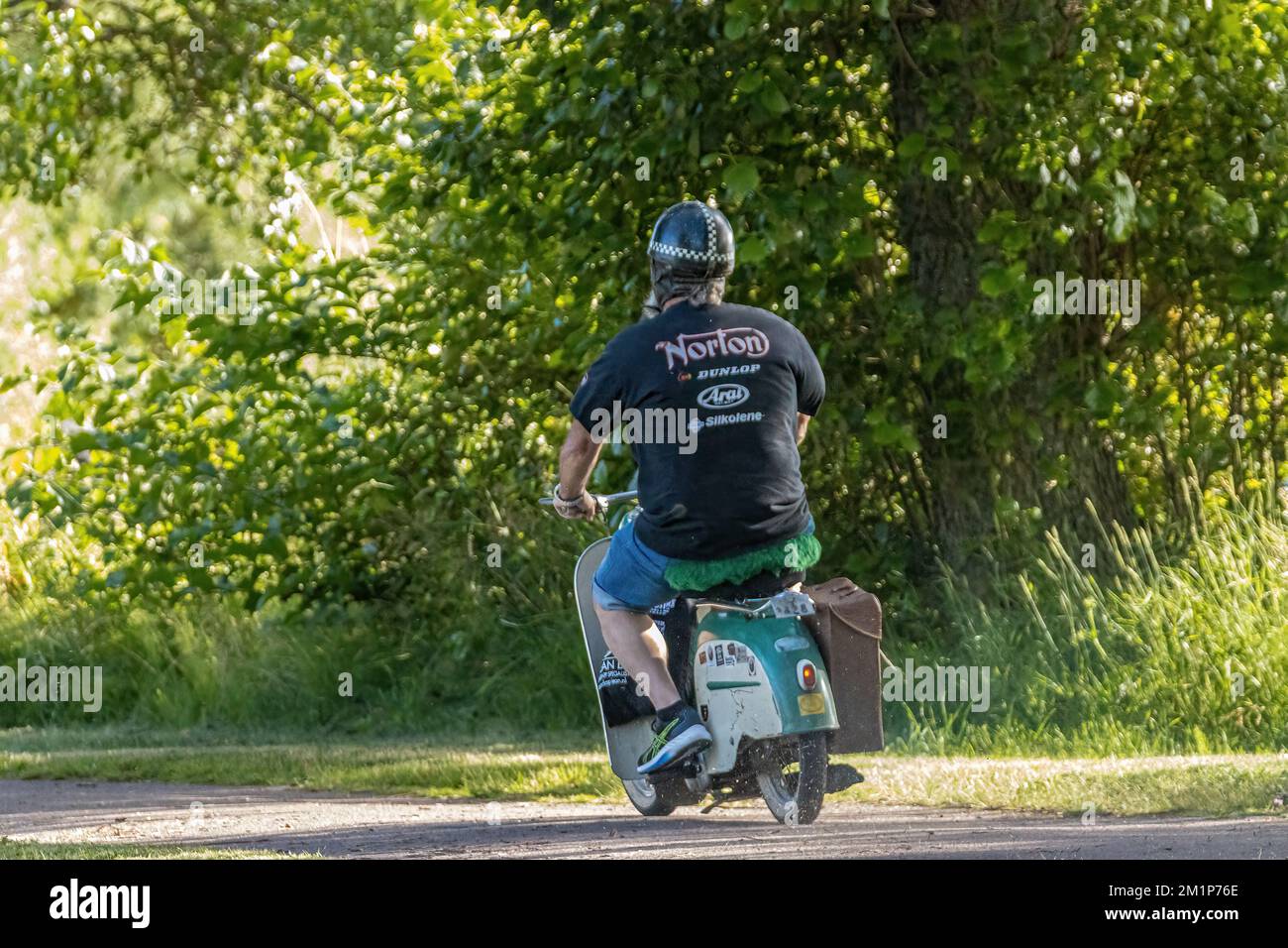 Moped helmet man hi-res stock photography and images - Alamy