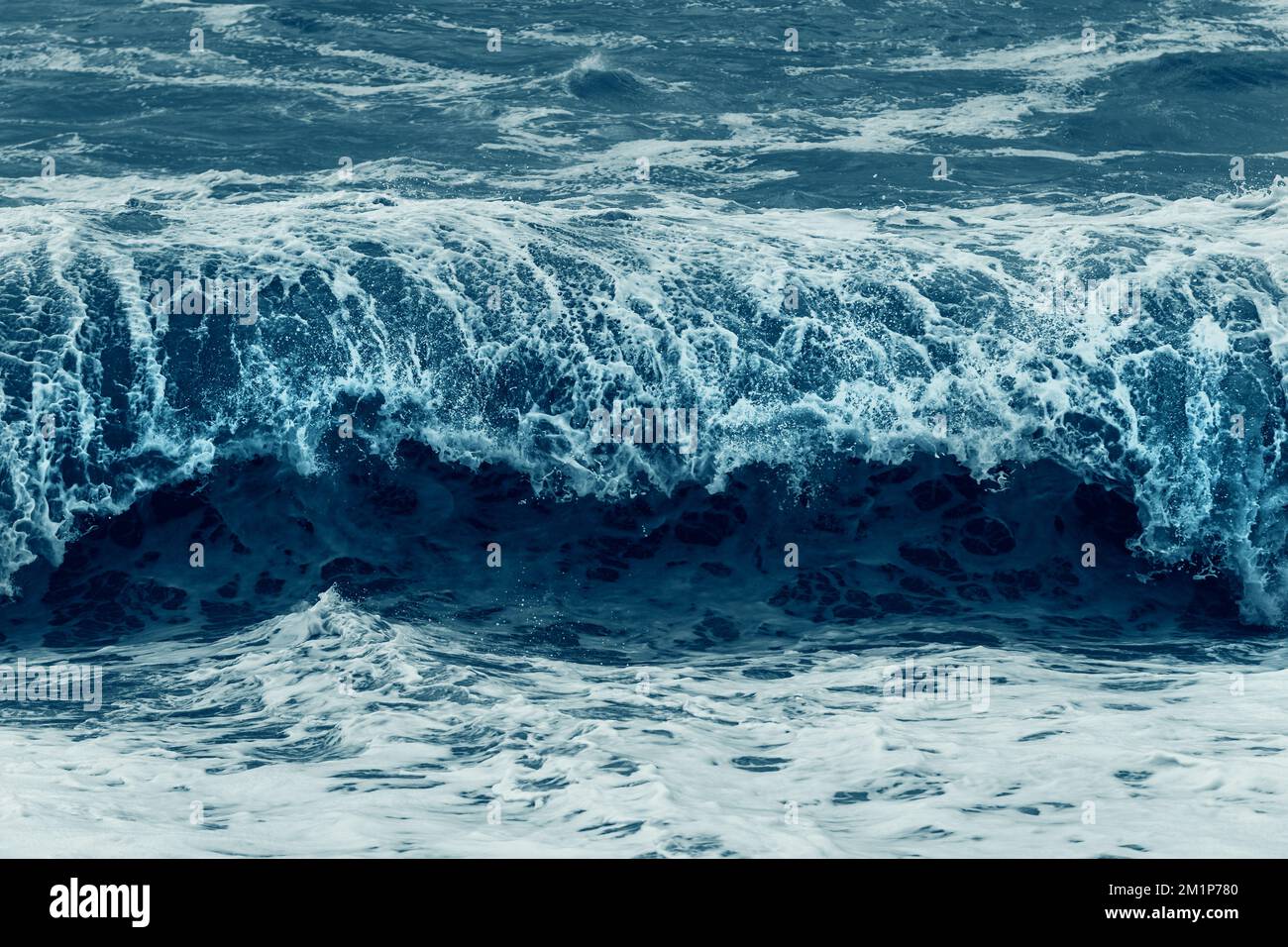 Dark blue dramatic sea storm. Ocean water bubbling near coast shore ...