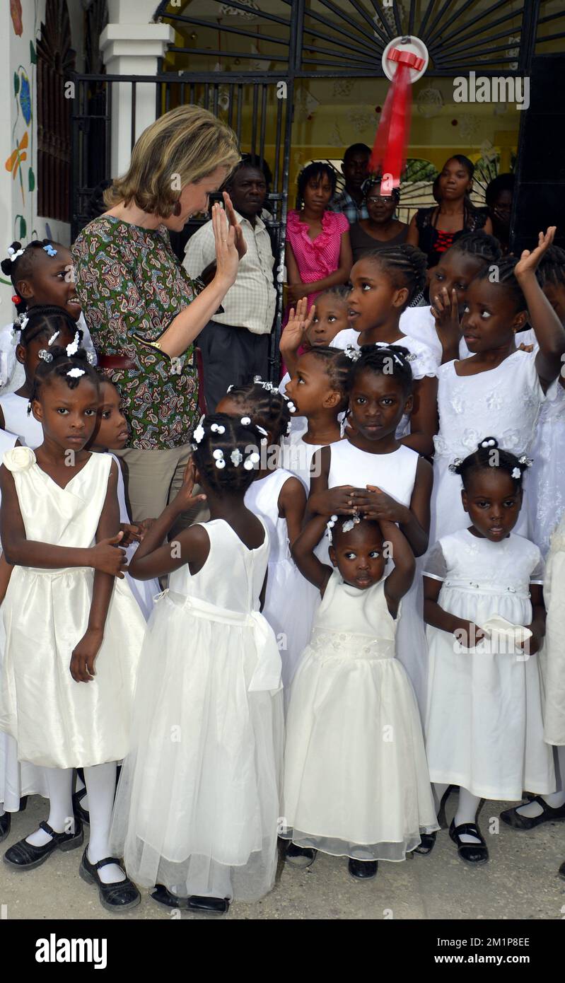 20121206 - PORT-AU-PRINCE, HAITI: Princess Mathilde of Belgium poses ...