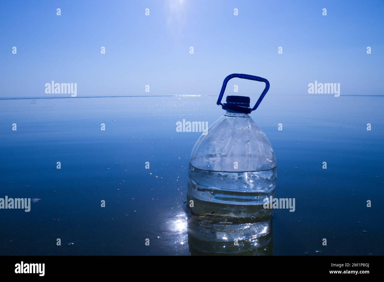 Concept of clean fresh water. Bottle in water Stock Photo - Alamy