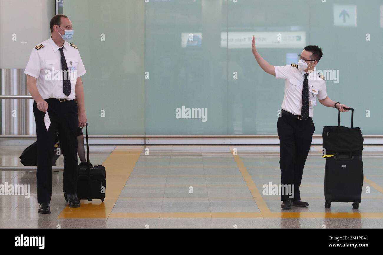 Cathay Pacific cabin crew members seen at the arrival Hall of the Hong ...