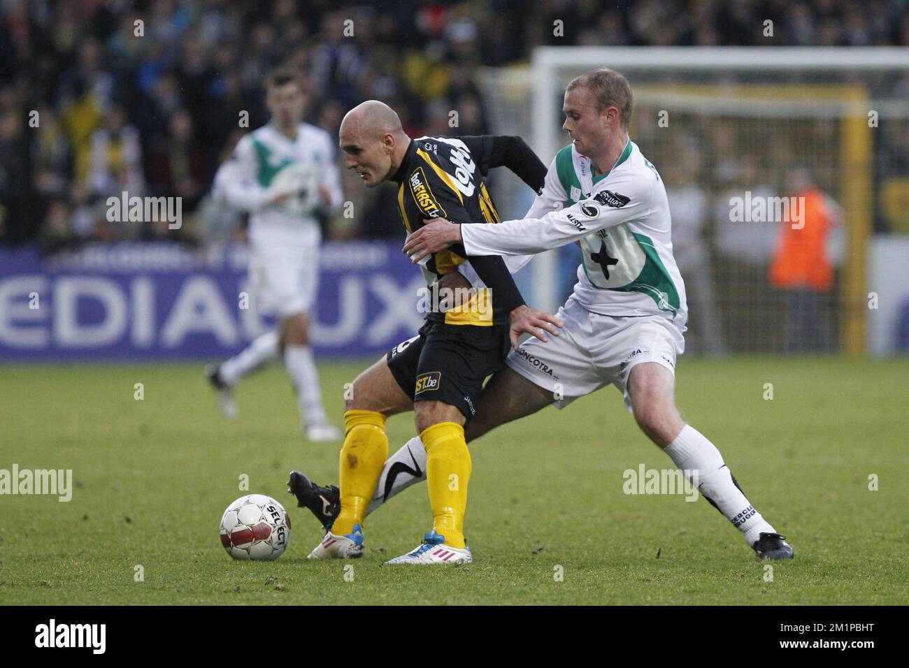 20121226 - LOKEREN, BELGIUM: Lokeren's Milos Maric and Cercle's Tim ...