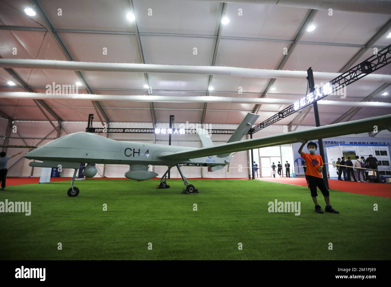 A UAV drone CH-4 is displayed. The 2022 World Robot Conference (WRC ...
