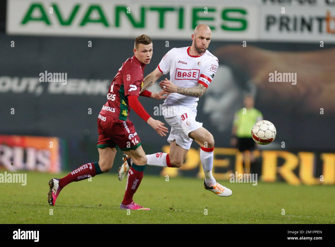 Essevee's Jens Naessens and Standard's Jelle Van Damme fight for the ...