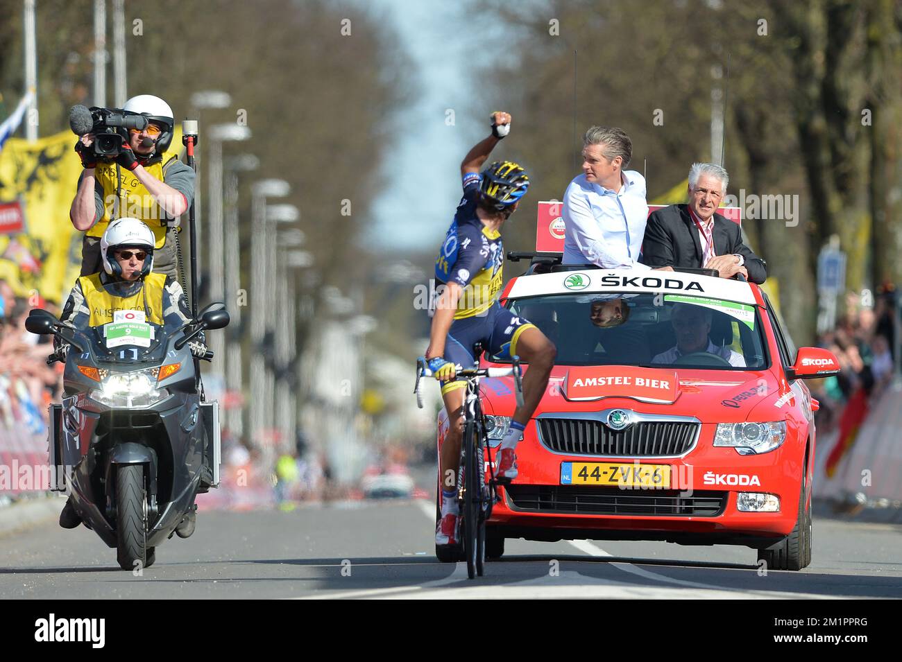 Czech Roman Kreuziger of team Saxo-Tinkoff celebrates as he crosses the ...