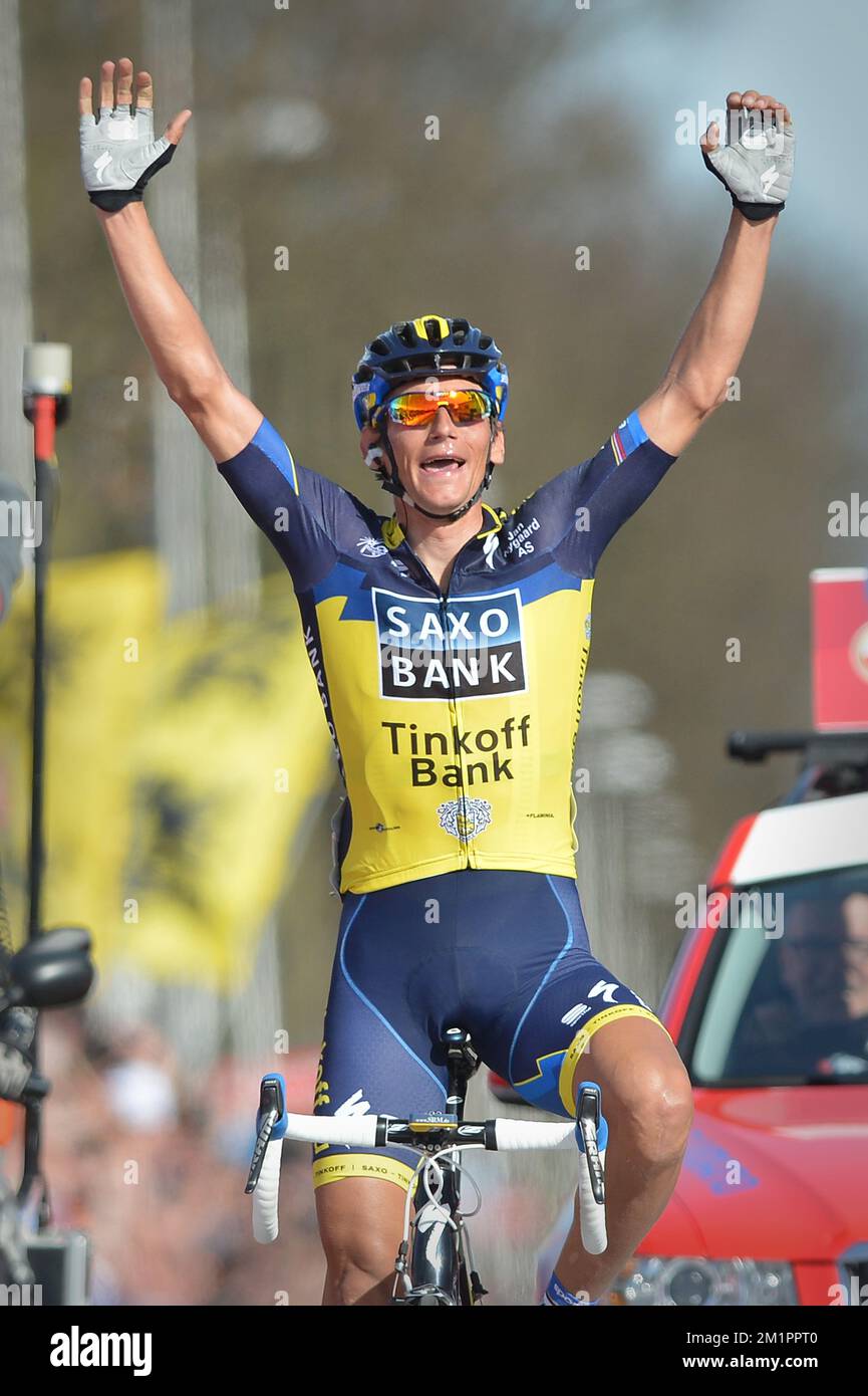 Czech Roman Kreuziger of team Saxo-Tinkoff celebrates as he crosses the ...