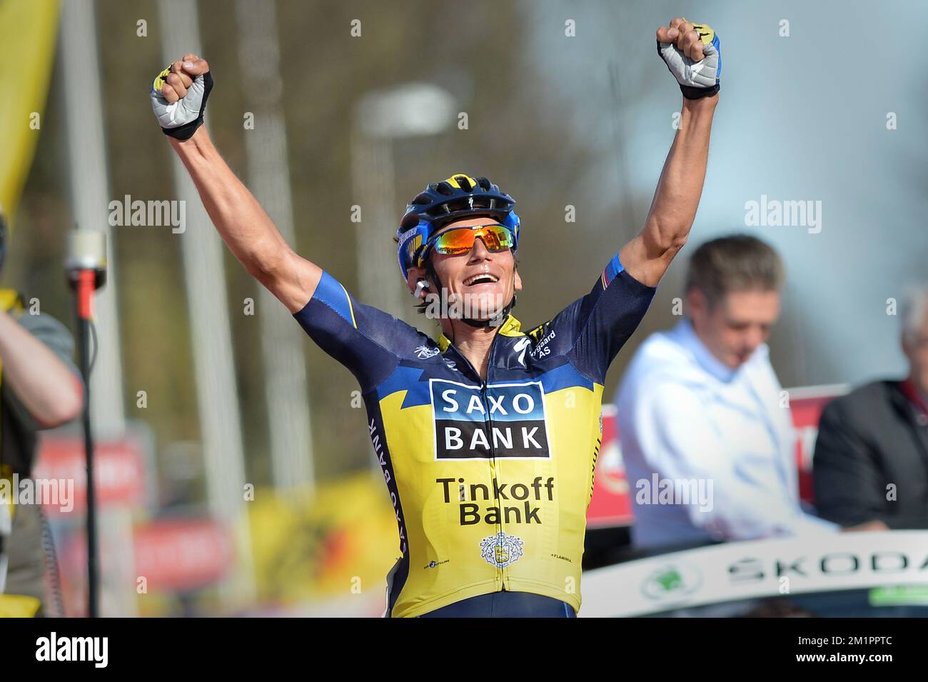 Czech Roman Kreuziger of team Saxo-Tinkoff celebrates as he crosses the ...