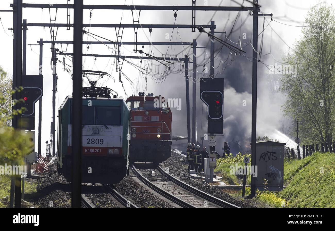 Illustration picture shows the exploded freight train on a track near ...