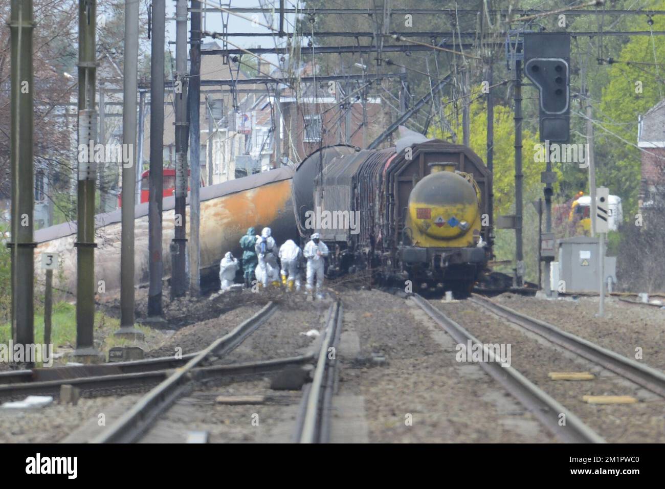 Illustration picture shows men in protective suits working to drain the ...
