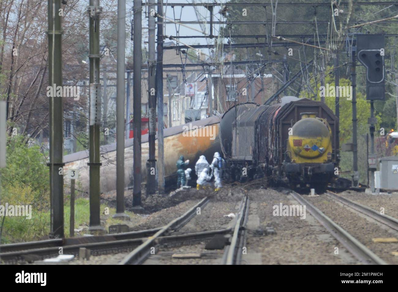 Illustration picture shows people in protective suits working to drain ...