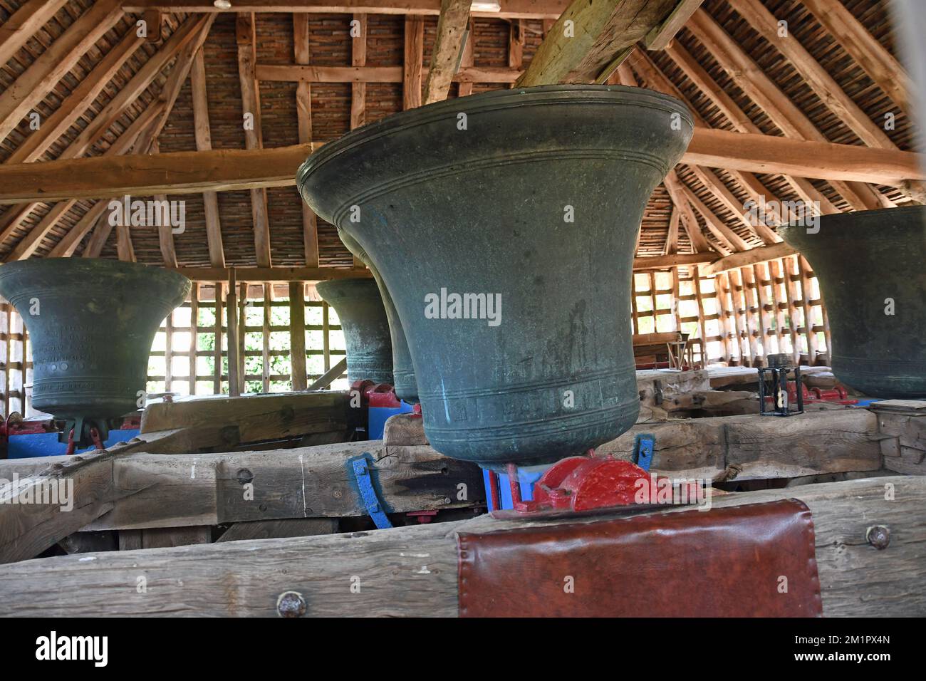 Bells in the bell cage at St Mary's Church, East Burgholt, Suffolk, UK ...
