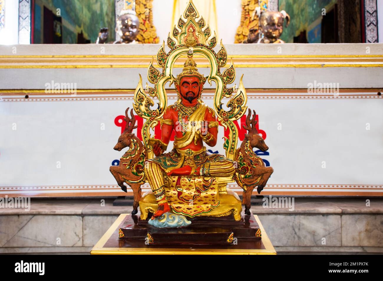 Orange ancient angel deity lord statue of Thursday for thai people ...