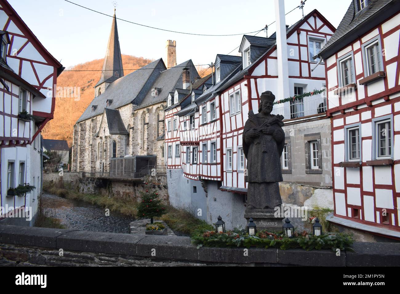 old bridge in Monreal with half-timbered houses and stone columns Stock ...