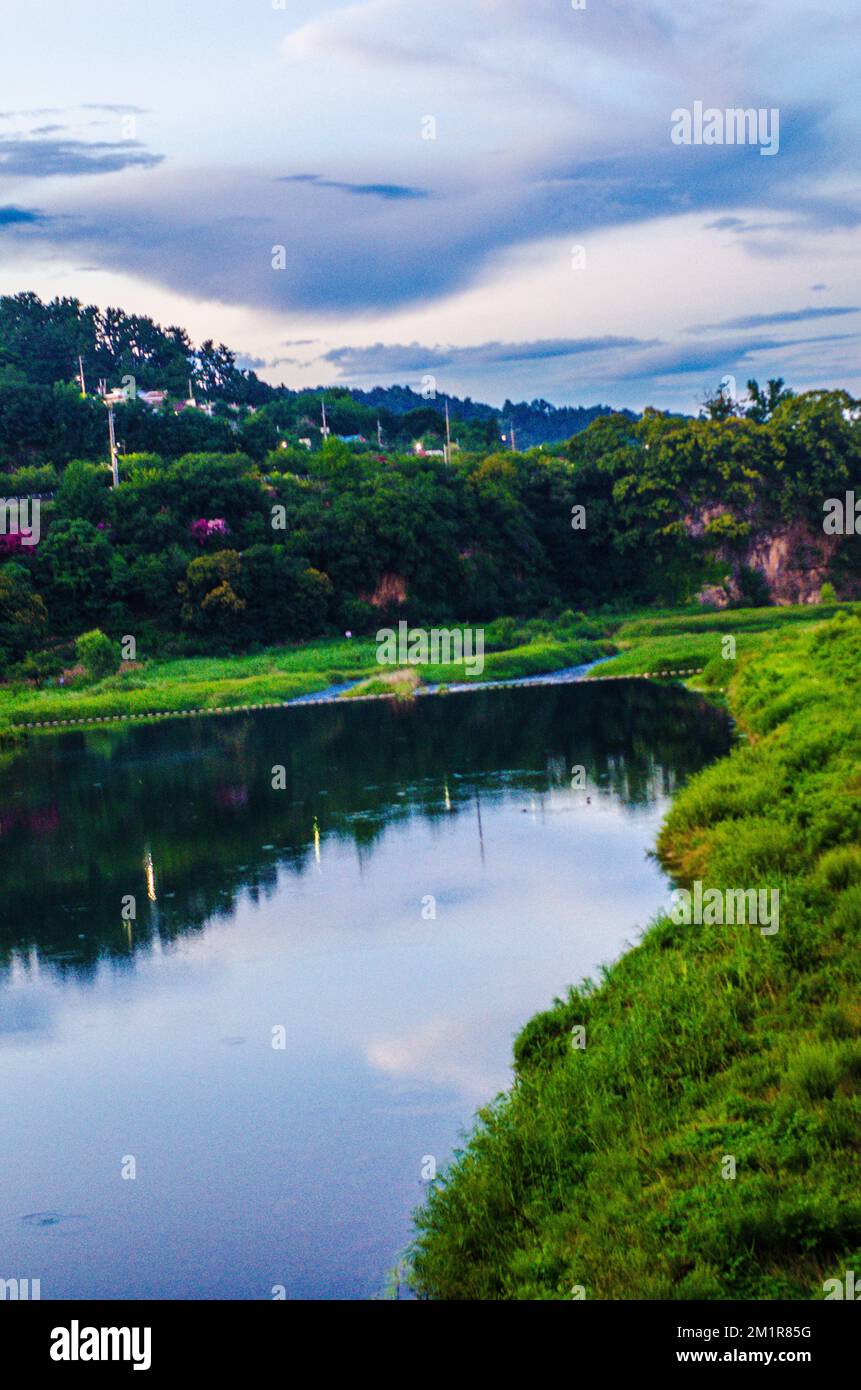 A breathtaking view of a river in Samcheok in South Korea, with a ...