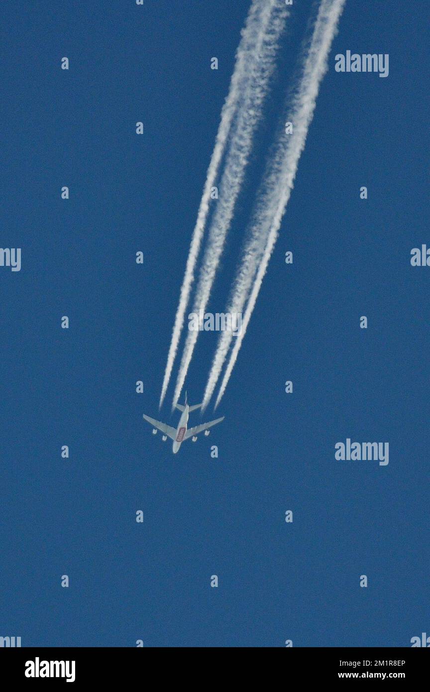 Contrails (condensation trails) are long thin artificial clouds behind ...