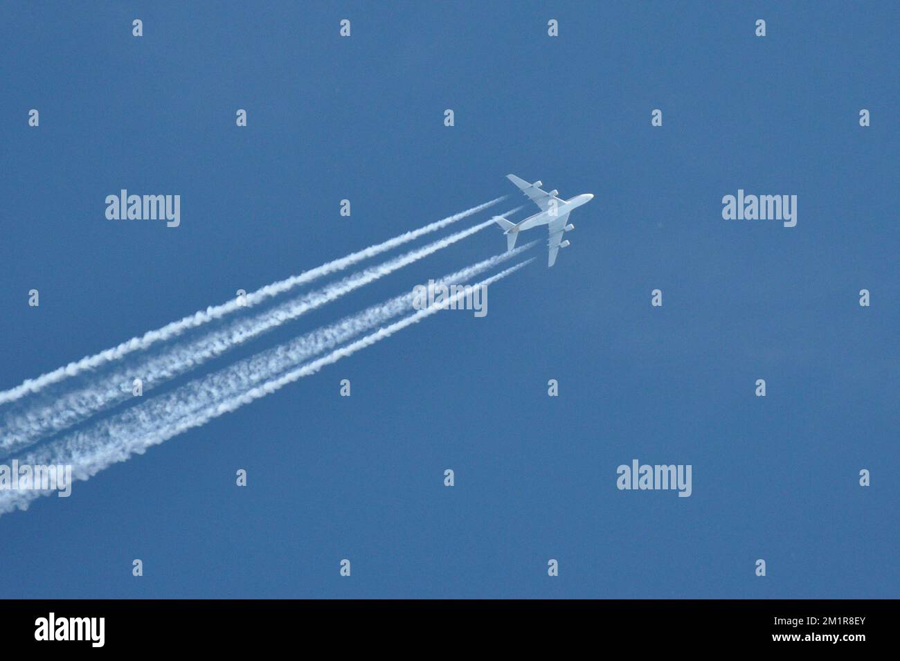 Contrails (condensation trails) are long thin artificial clouds behind ...