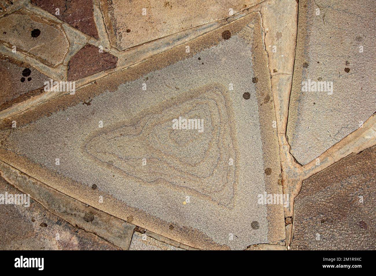 The first drops of rain on a rock path in the Namib desert Stock Photo ...