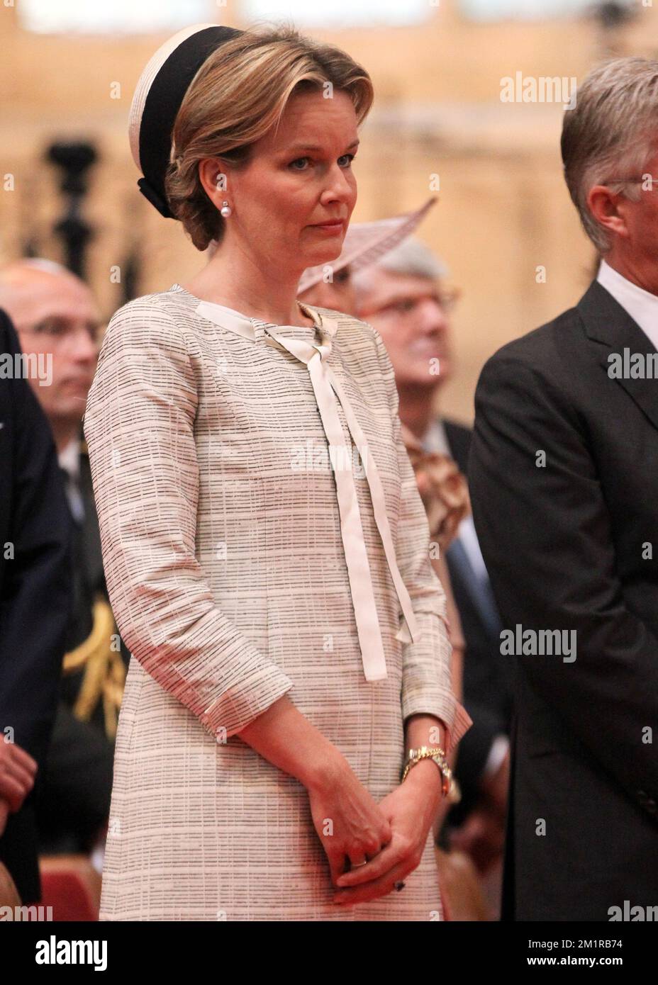 Queen Mathilde stands at a mass on the occasion of the 20th anniversary ...