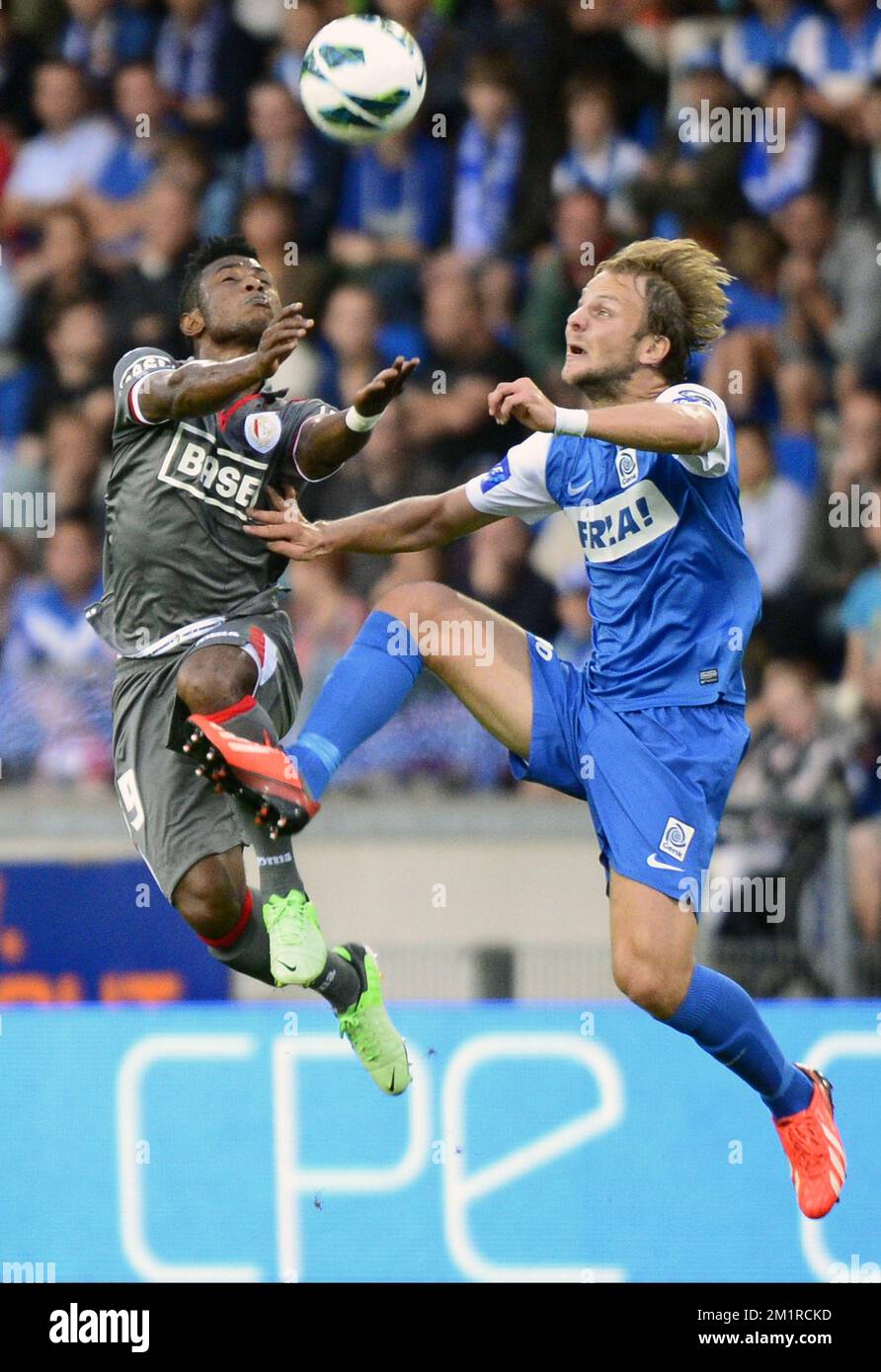 Standard's Imoh Ezekiel and Genk's Julien Gorius fight for the ball ...