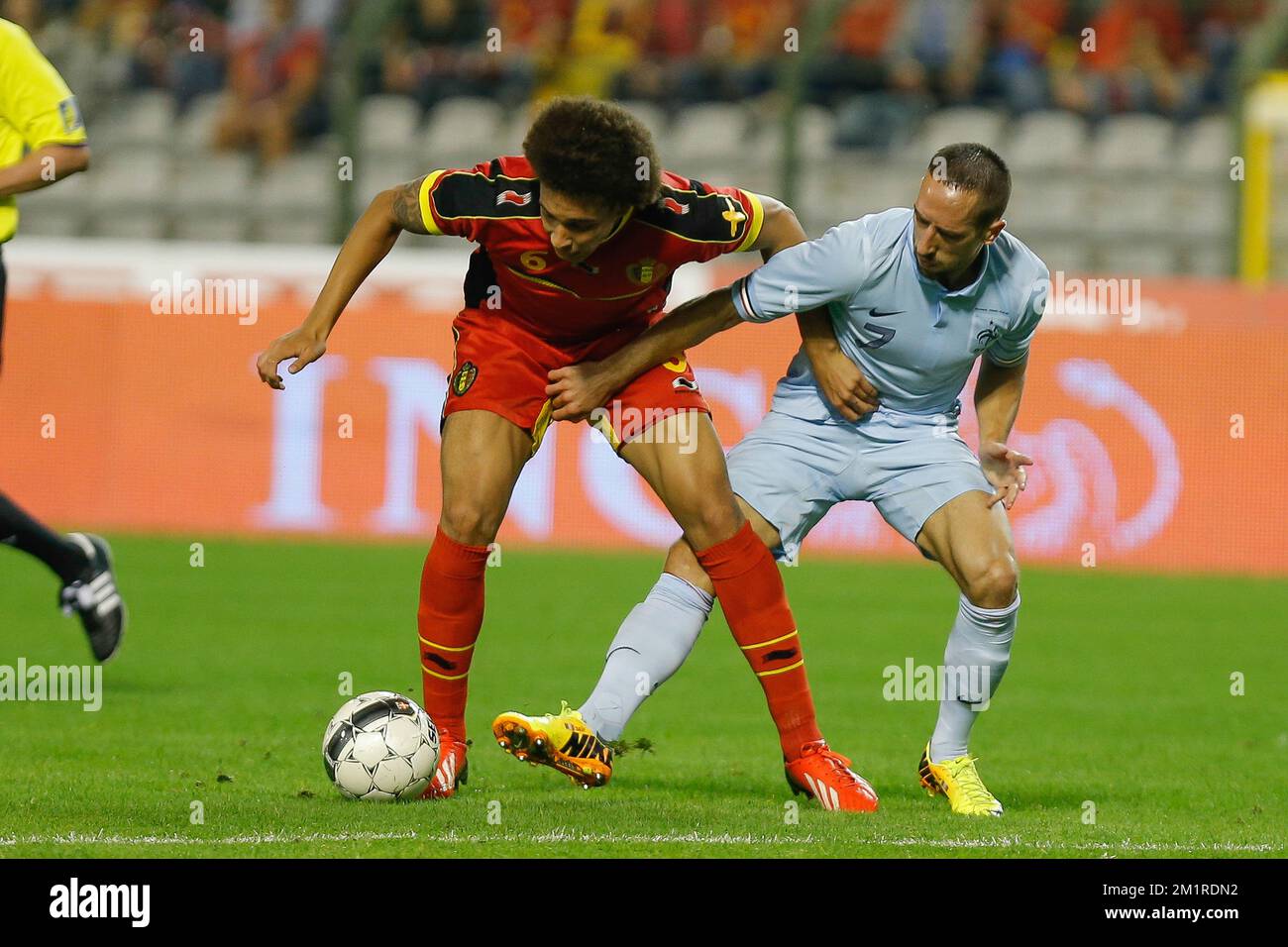 Belgium's Axel Witsel and French Franck Ribery fight for the ball ...