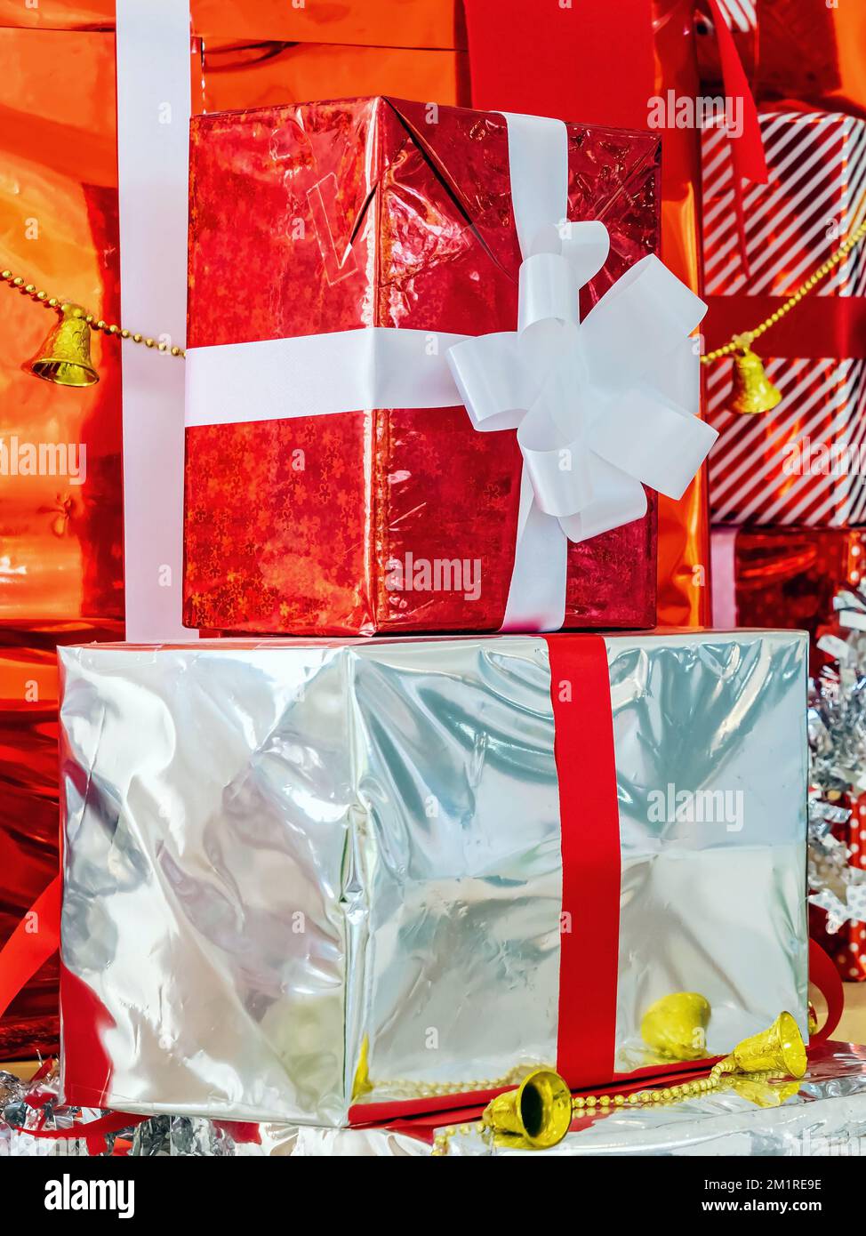 Colorful Christmas gift boxes with ribbon and Christmas decorations on ...