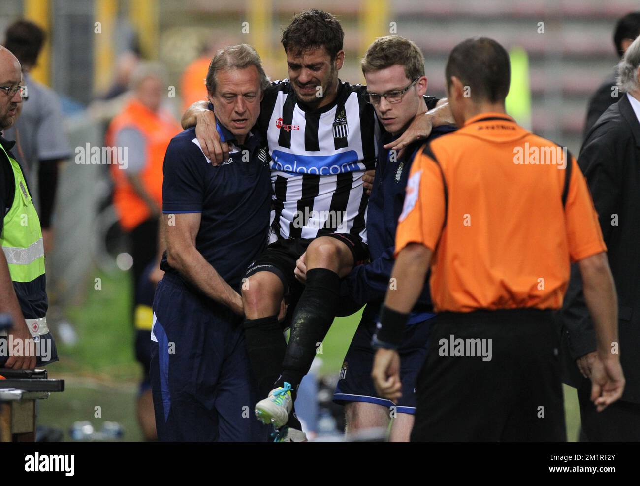 Charleroi's Javier Martos Francisco leaves the pitch after being ...