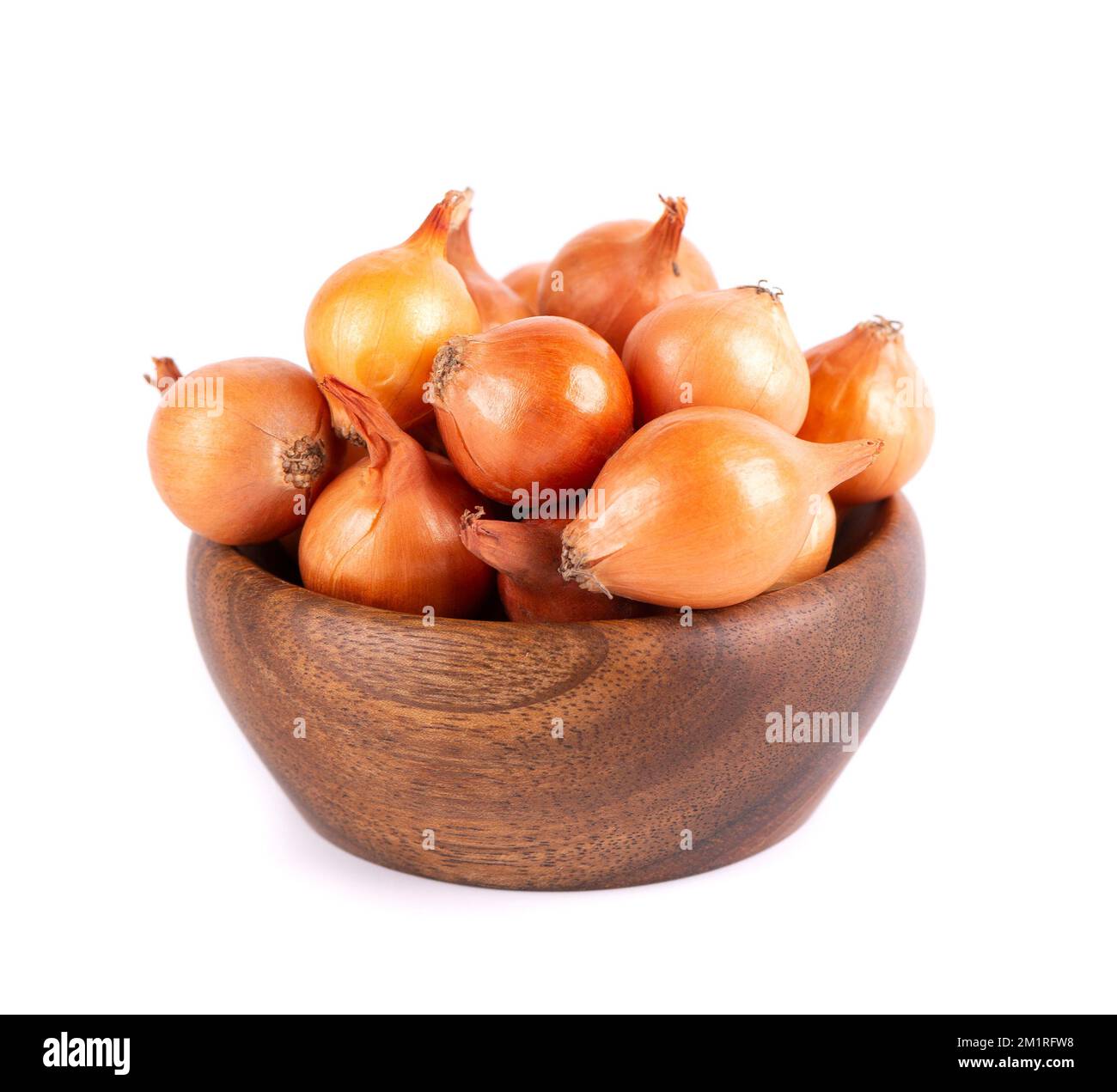 Brown mini onions in wooden bowl, isolated on a white background. Raw ...