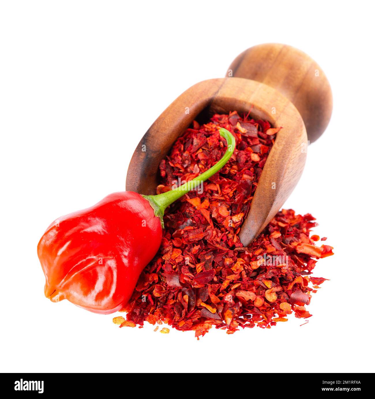 Fresh and dry ground red chili peppers isolated on white background ...
