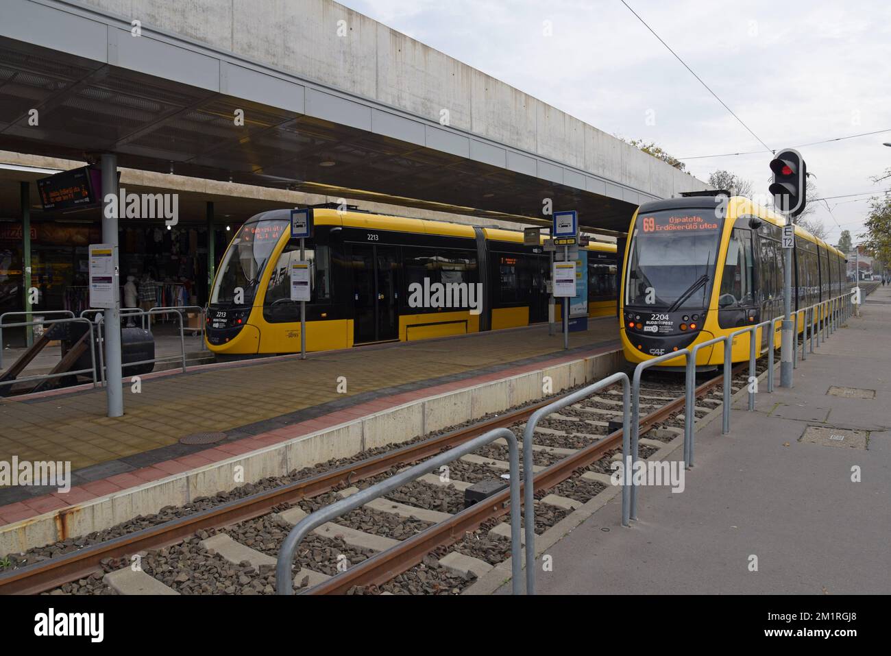 Budapest CAF Urbos trams at Mexikói út Metro station and tram stop ...