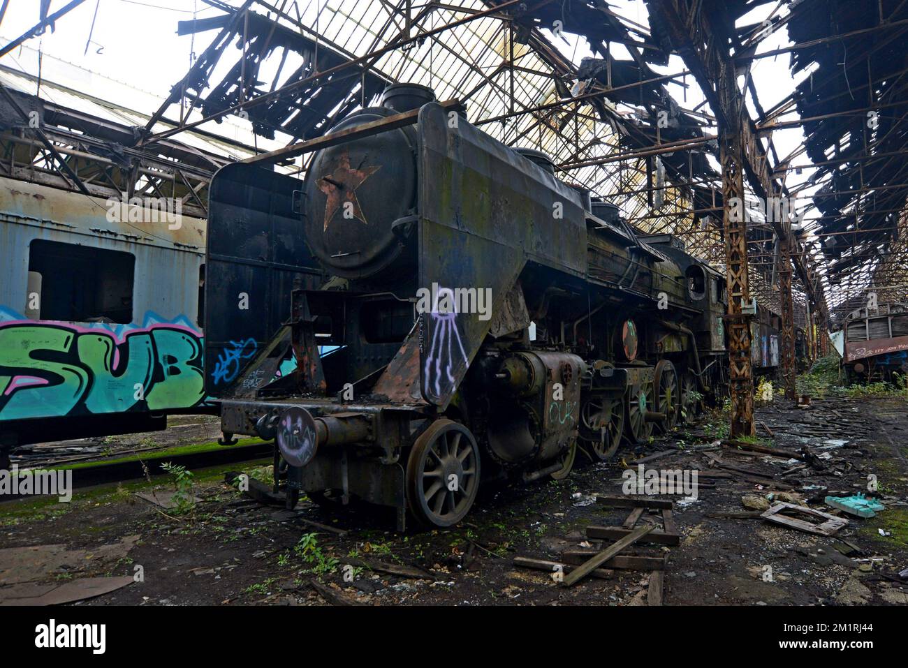 Abandoned derelict steam locomotive in the Red Star train Graveyard ...