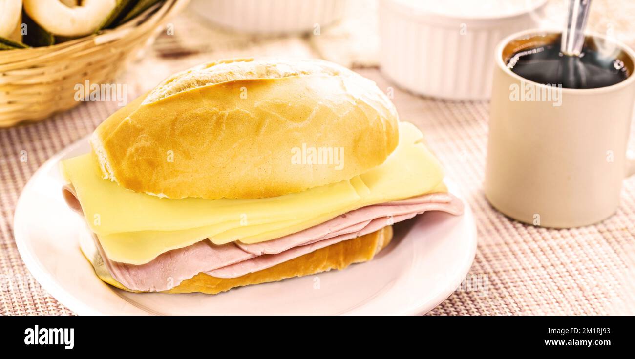Brazilian breakfast, french salt bread with mozzarella cheese and ham ...