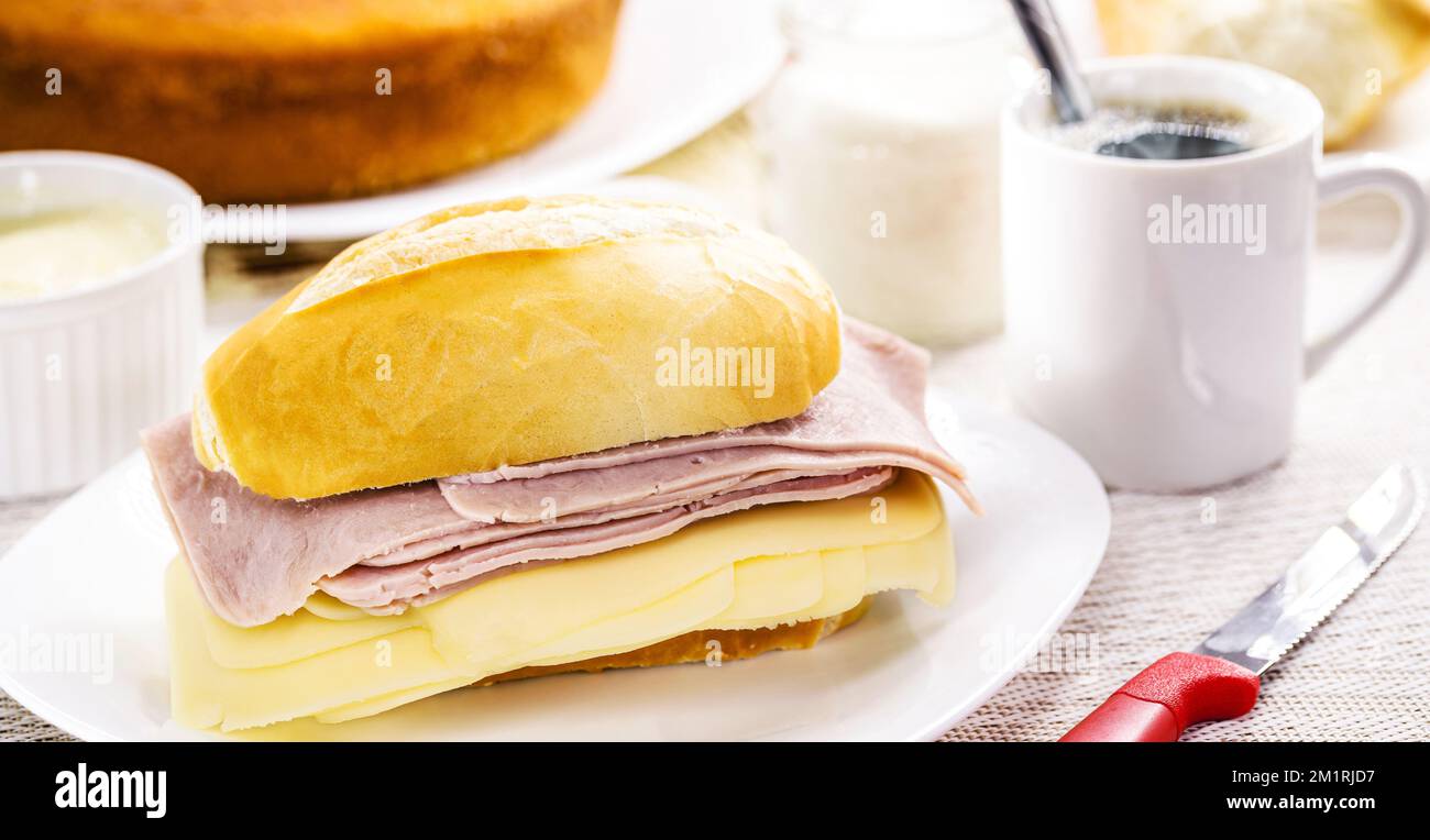 Brazilian breakfast, french salt bread with mozzarella cheese and ham ...