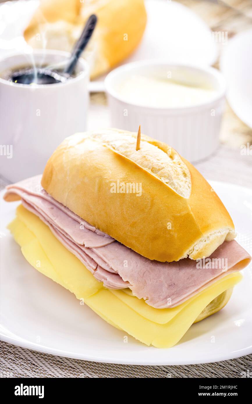 Brazilian breakfast, french salt bread with mozzarella cheese and ham ...