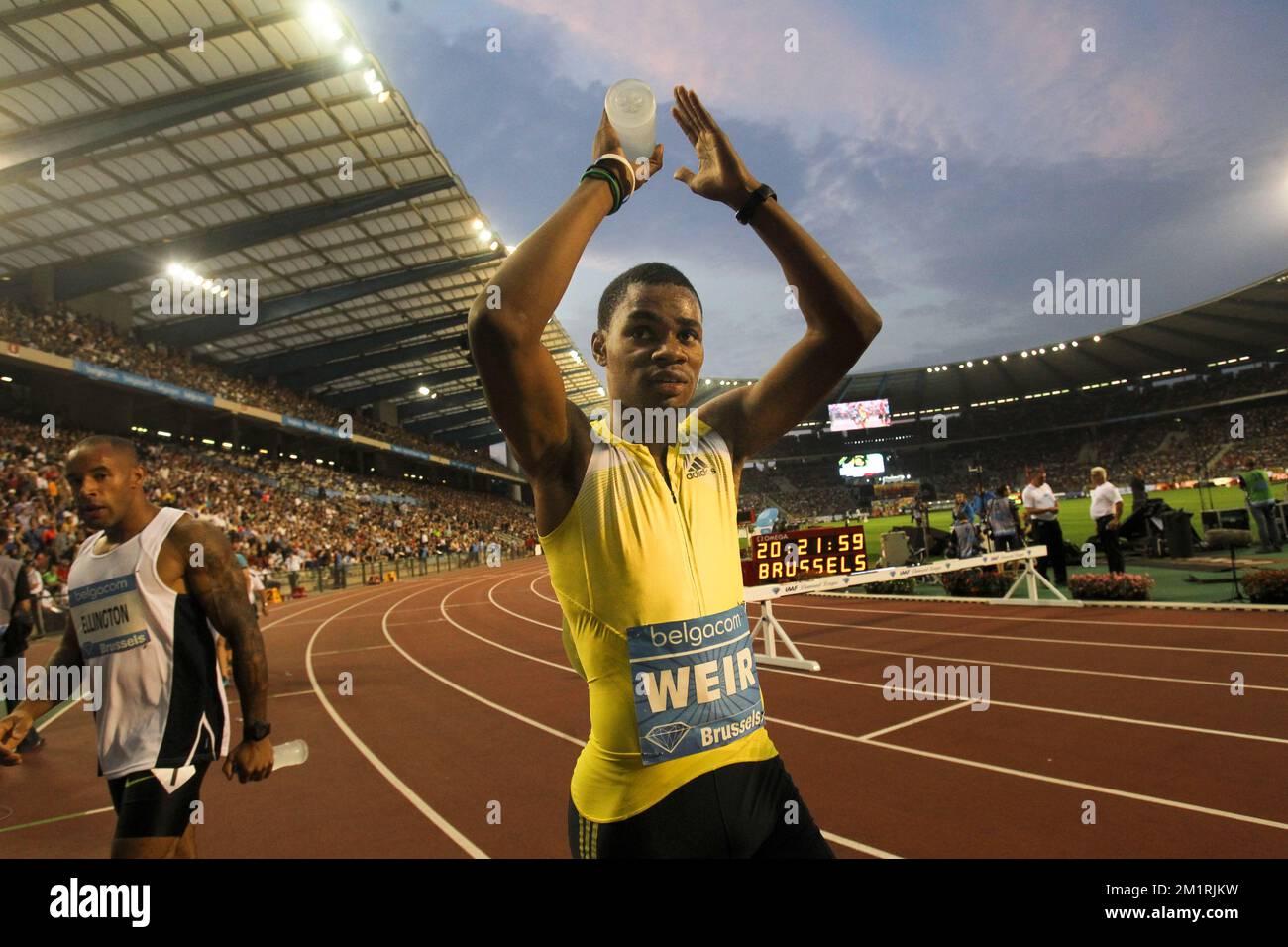 Jamaica's Warren Weir celebrates as he crosses the finish line to win ...